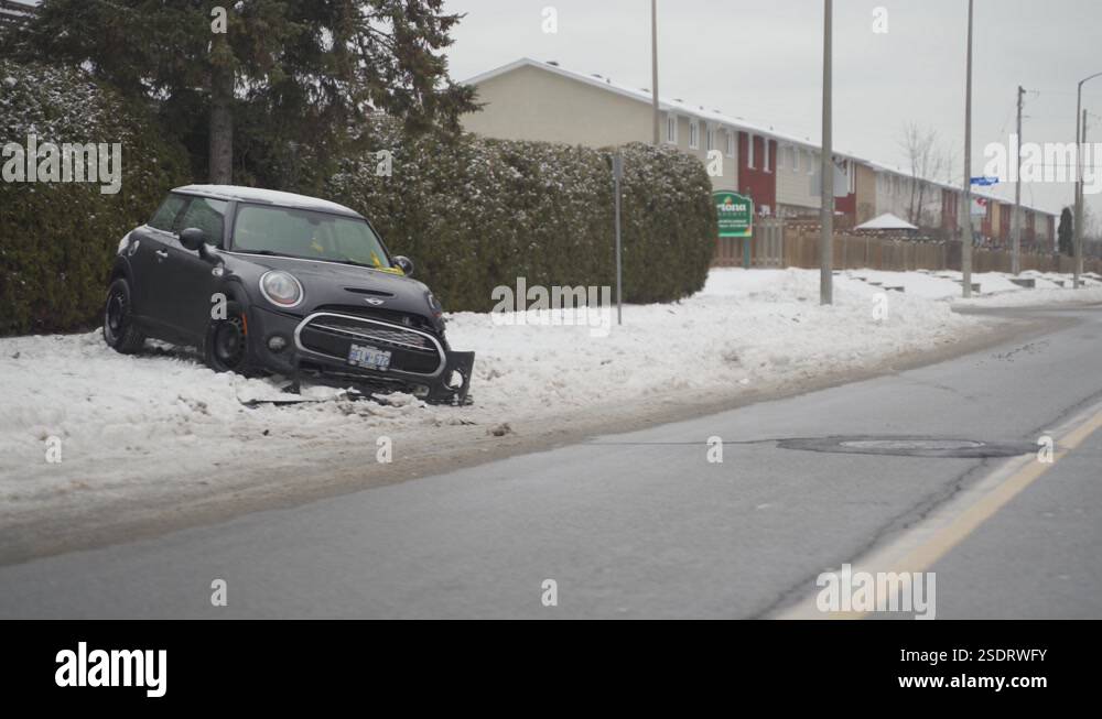 Car crash aftermath with a car on the side of the road Stock Video ...