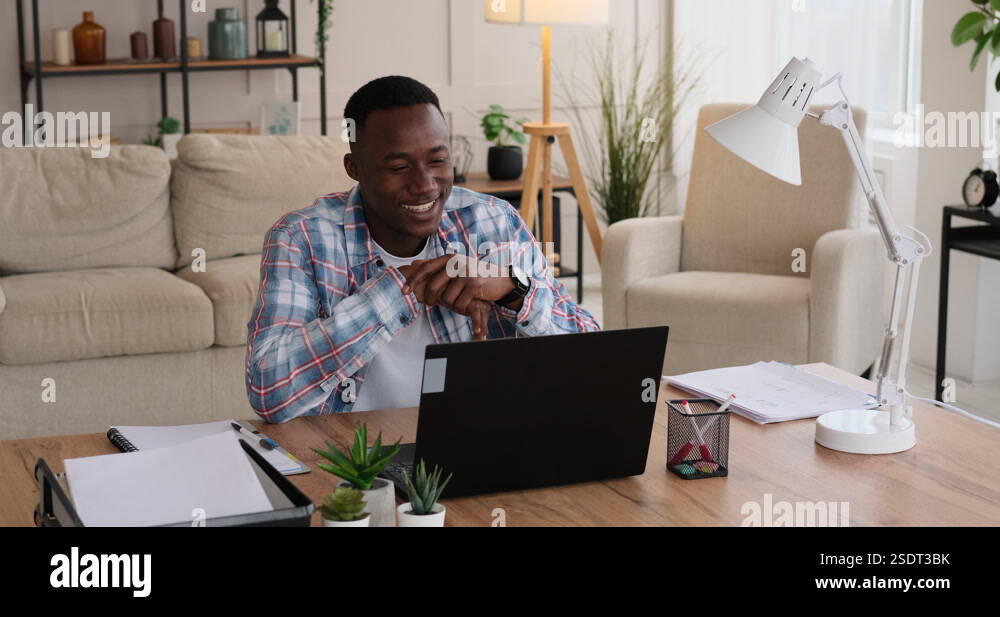 Man using laptop for video conference at home office Stock Video ...