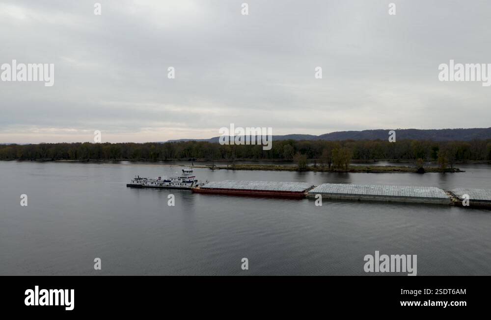 Large cargo barge on the Mississippi River. Cargo ships transporting ...