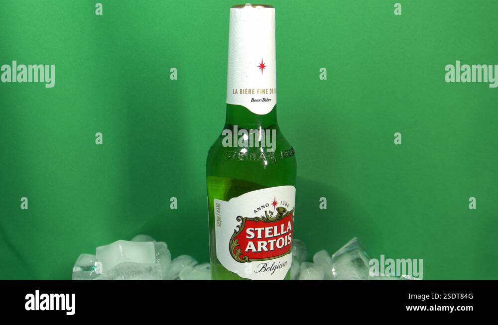 3-3 Sealed rotating 360 degrees green bottled Stella Artois plsner beer ...
