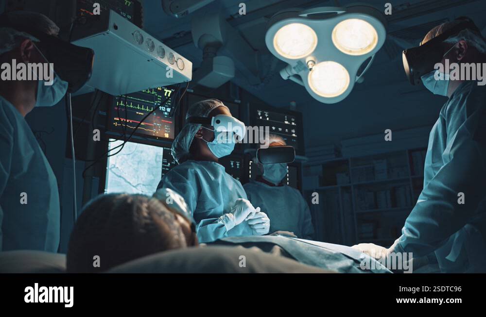 Female confident doctor wearing augmented reality glasses typing at the ...