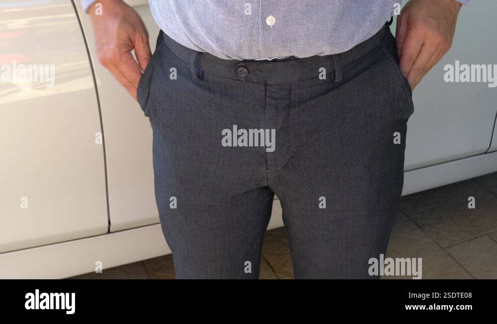 Man put his hand inside pocket and come out empty. Poverty or no money ...