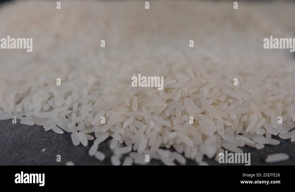 rice falling black background slow motion Stock Video Footage - Alamy