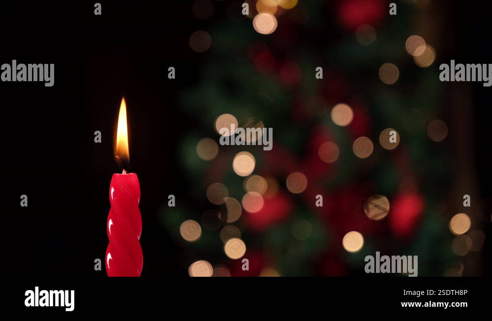 Christmas red candle light candlelight by side Stock Video Footage - Alamy