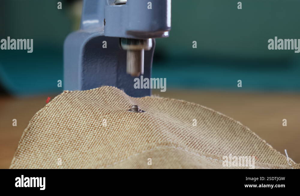 Garment Making Workshop. Factory. Piece of Cloth is Fastened under ...