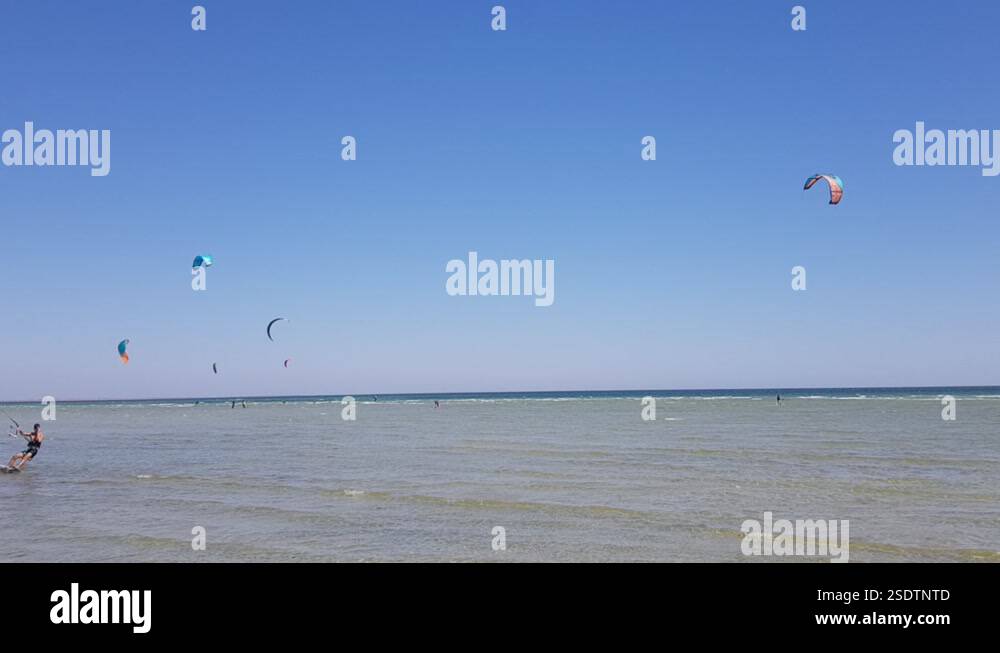 Kite boarding, Kite surfer at sea. Extreme water sports. Kiteboarding ...