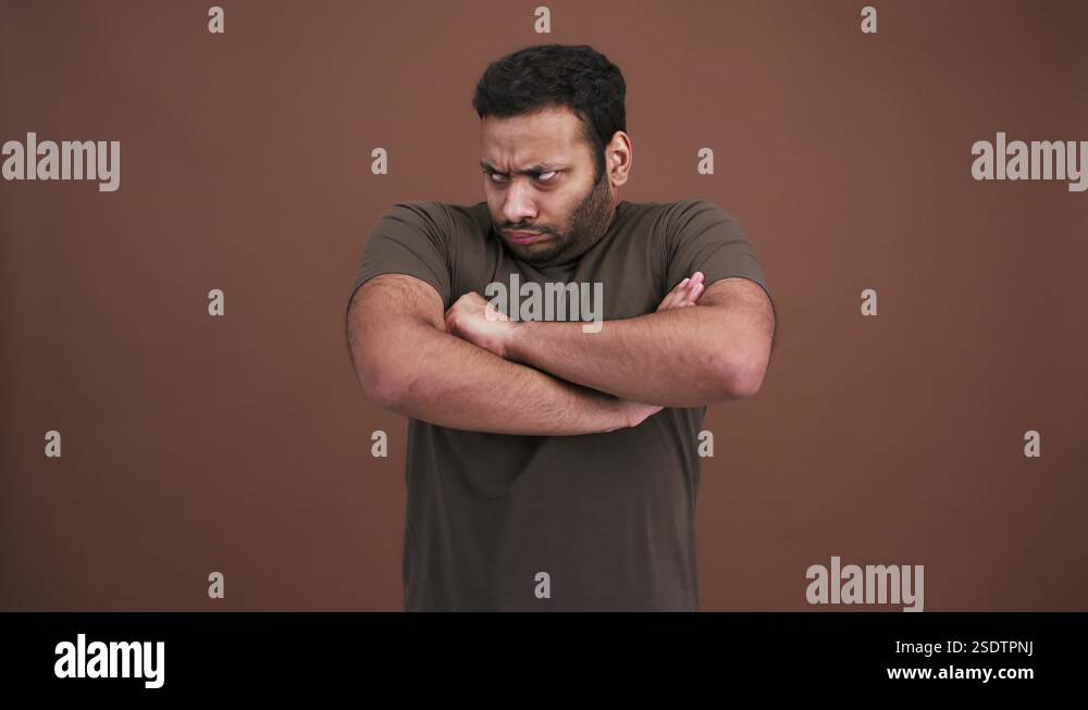 Grumpy man folded arms Stock Videos & Footage - HD and 4K Video Clips - Alamy
