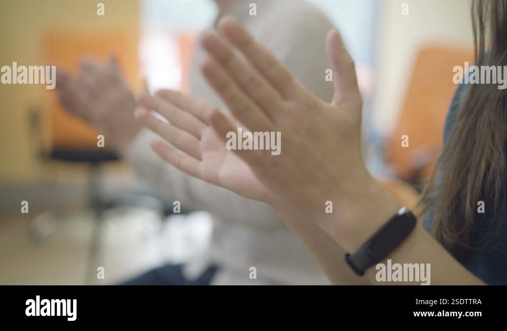 Side view of unrecognizable Caucasian man and woman sitting indoors and ...