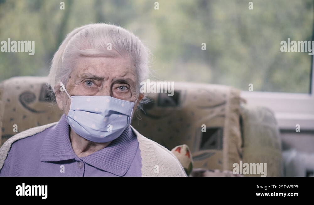 Medical mask. An old grandmother with a medical mask Stock Video ...