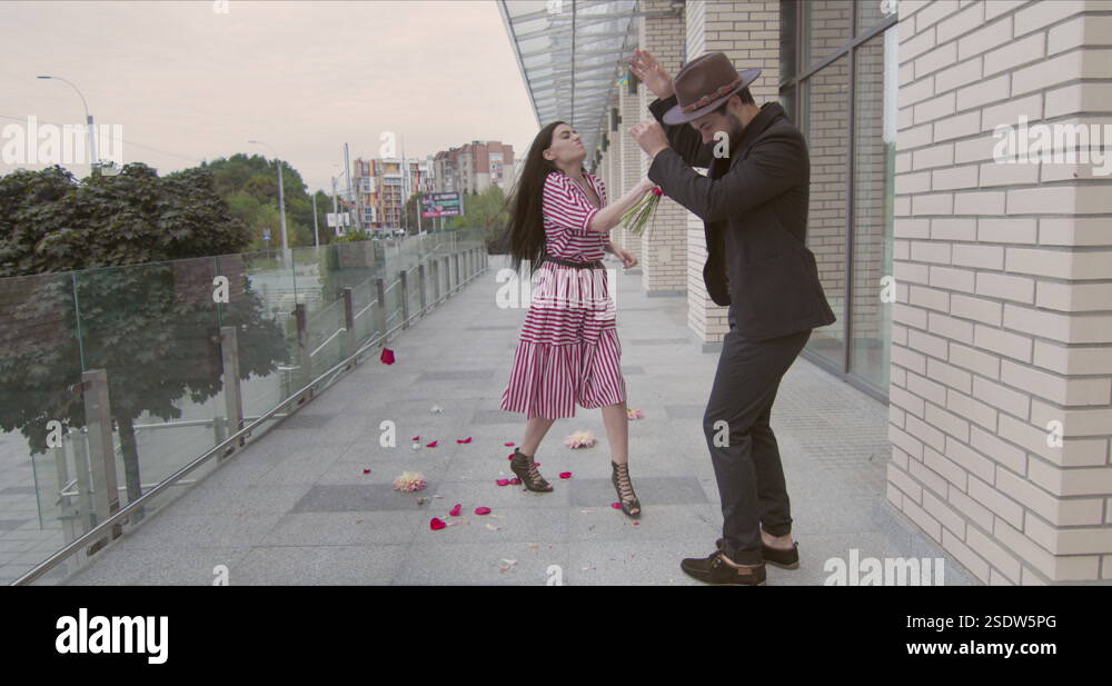 a young couple quarreled during a date and the girl hit the guy with a ...