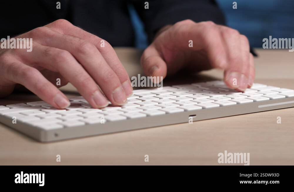 Typing on a Wireless Computer Keyboard a Text With Both Hands Stock ...