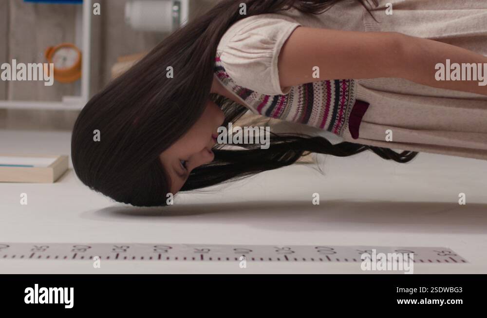Little girl hits her head against the wall. Video for the vertical ...