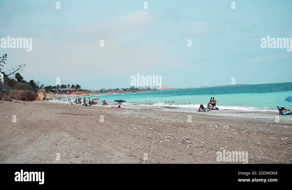 Tourists Enjoying Summer At The Beach - Playa Mar Chica In Benicarlo ...