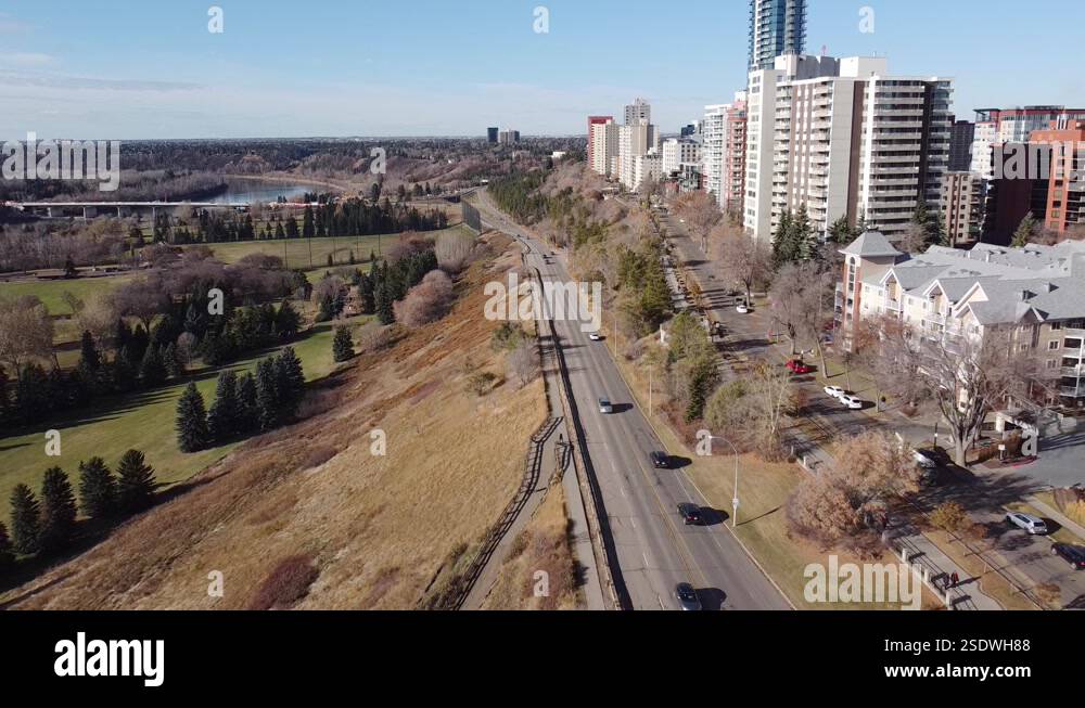 aerial fly over drop by rivers edge vip golf course park in the fall ...