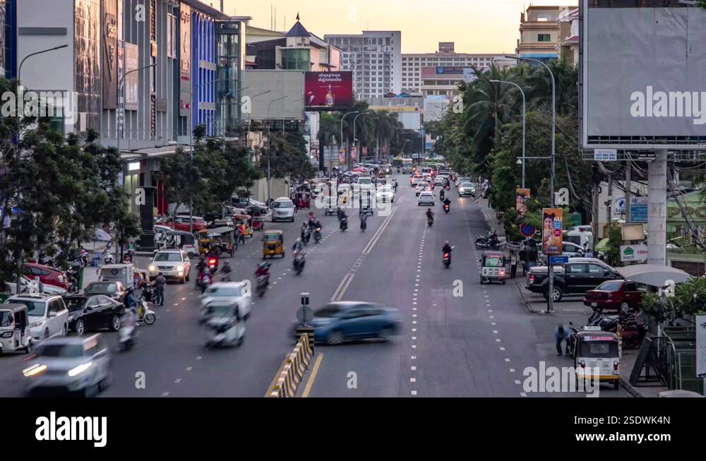 Urban traffic in Asian city center of PHnom Penh in Cambodia. Traffic ...
