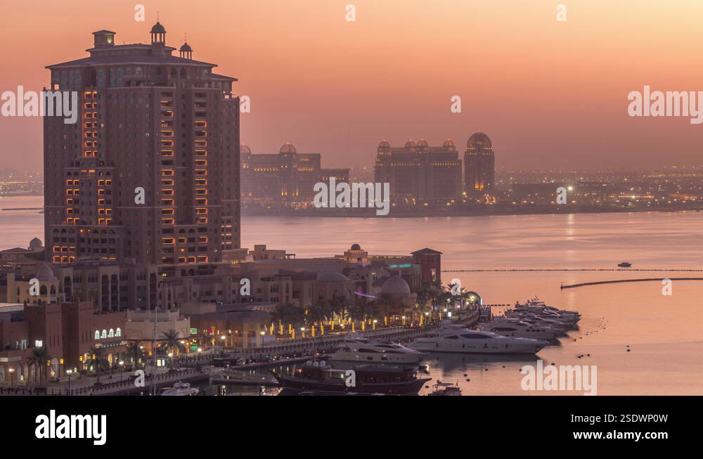 Evening at the Pearl-Qatar day to night timelapse from top Stock Video ...