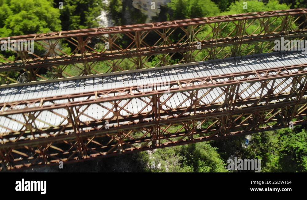 a rusted metal bridge in the middle of the forest in cyprus. with cool ...