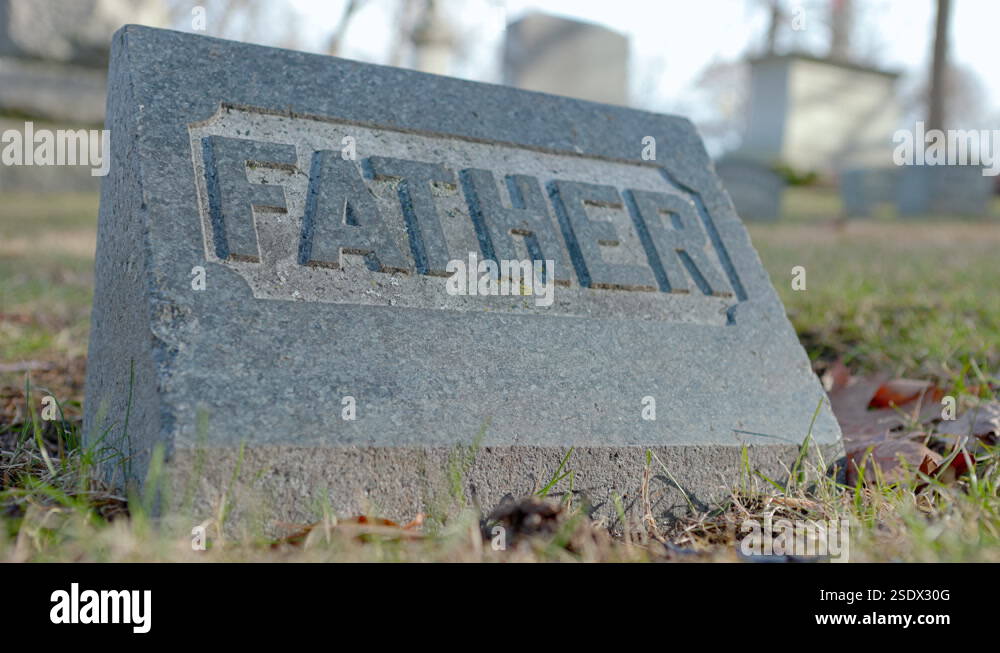 Father grave stone at graveyard 4k Stock Video Footage - Alamy