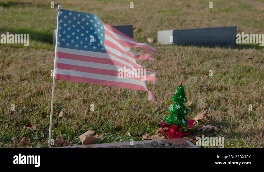 American Flag waving over grave during holiday season 4k Stock Video ...
