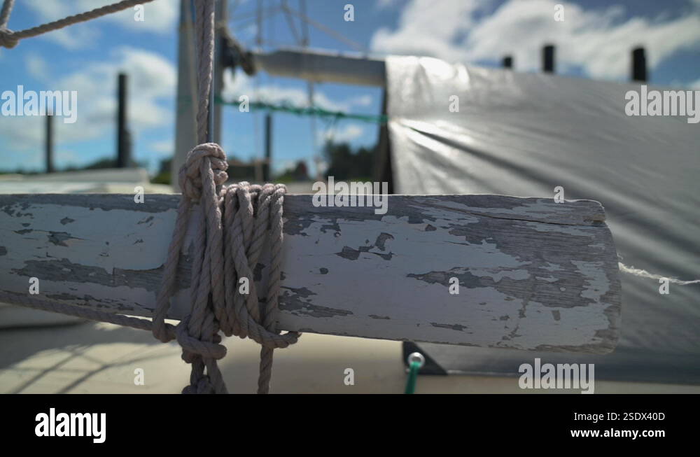 Rope Tied On Horizontal Wooden Part Of A Sailing Boat - close up ...