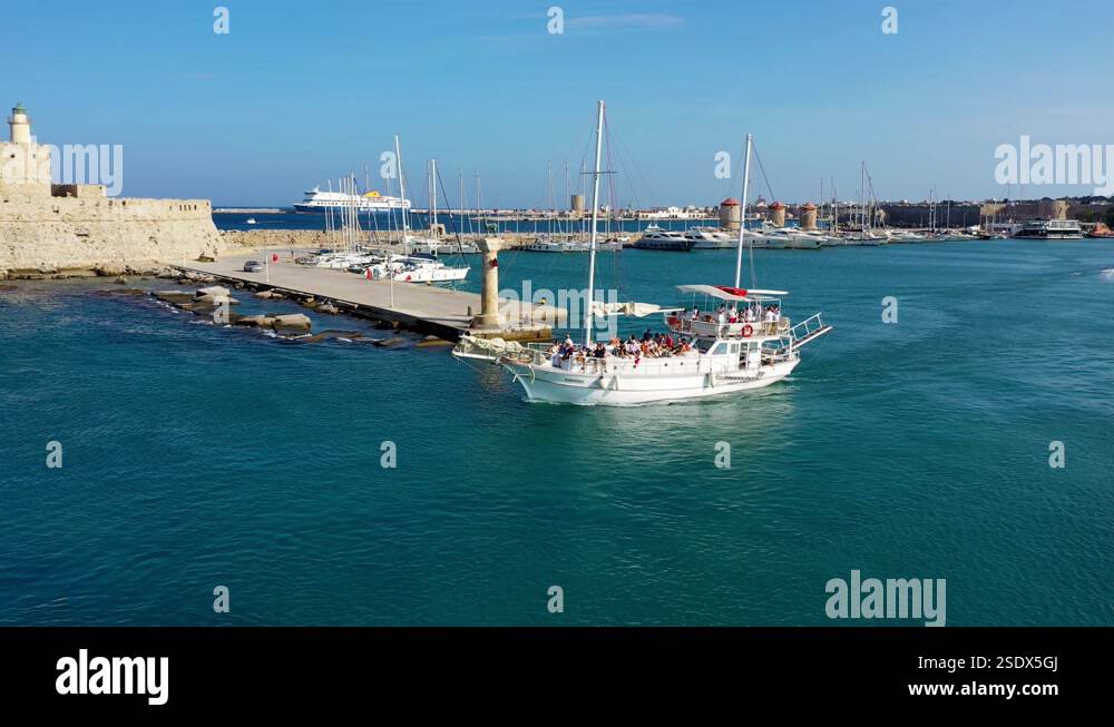 Mandraki port with deers statue, where The Colossus was standing and ...