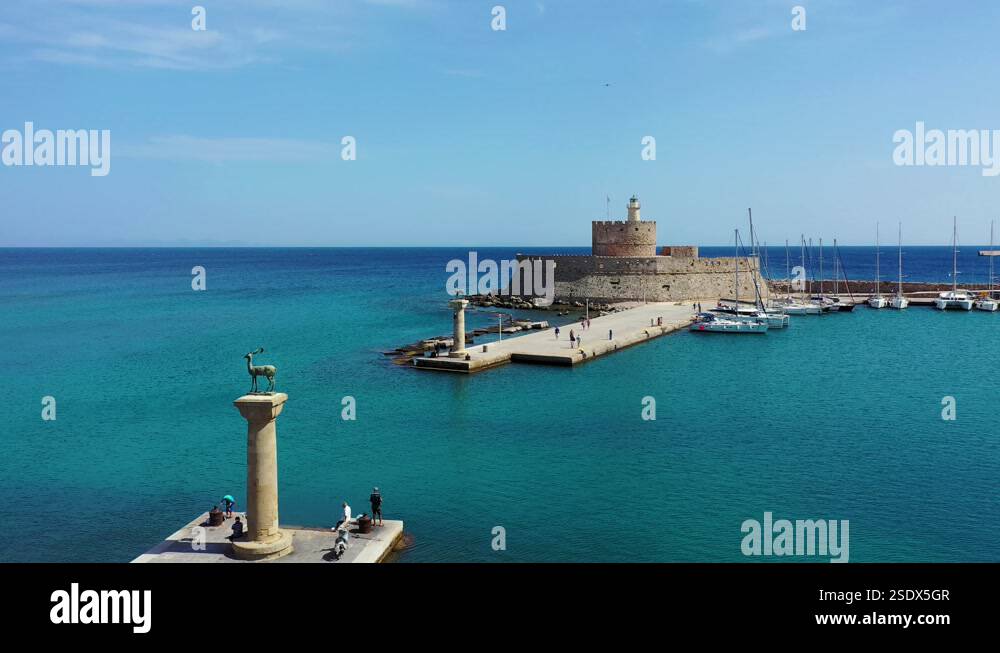 Mandraki port with deers statue, where The Colossus was standing and ...