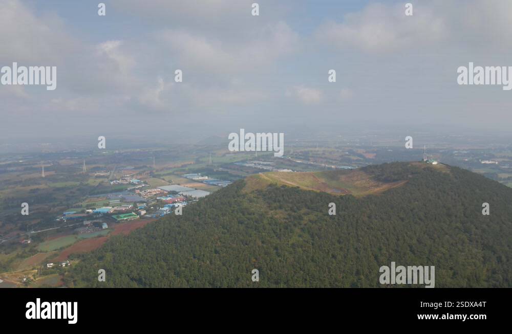 Counter-clockwise Dolly-out Aerial View of Geum Oreum, Jeju, South ...