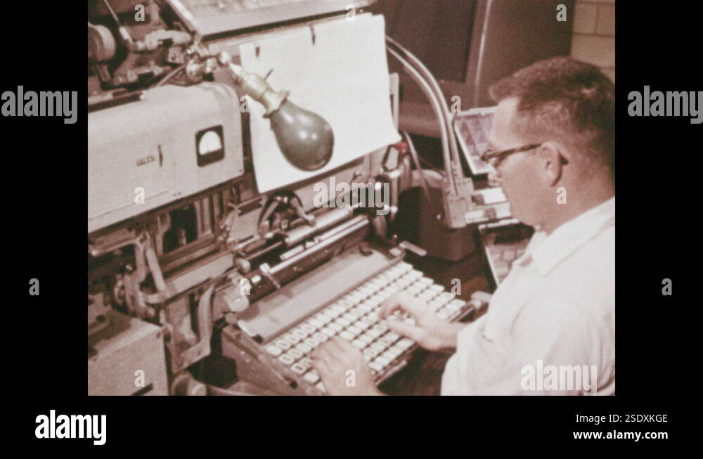 1970s: Man operates photo static machine creating schematic drawings ...