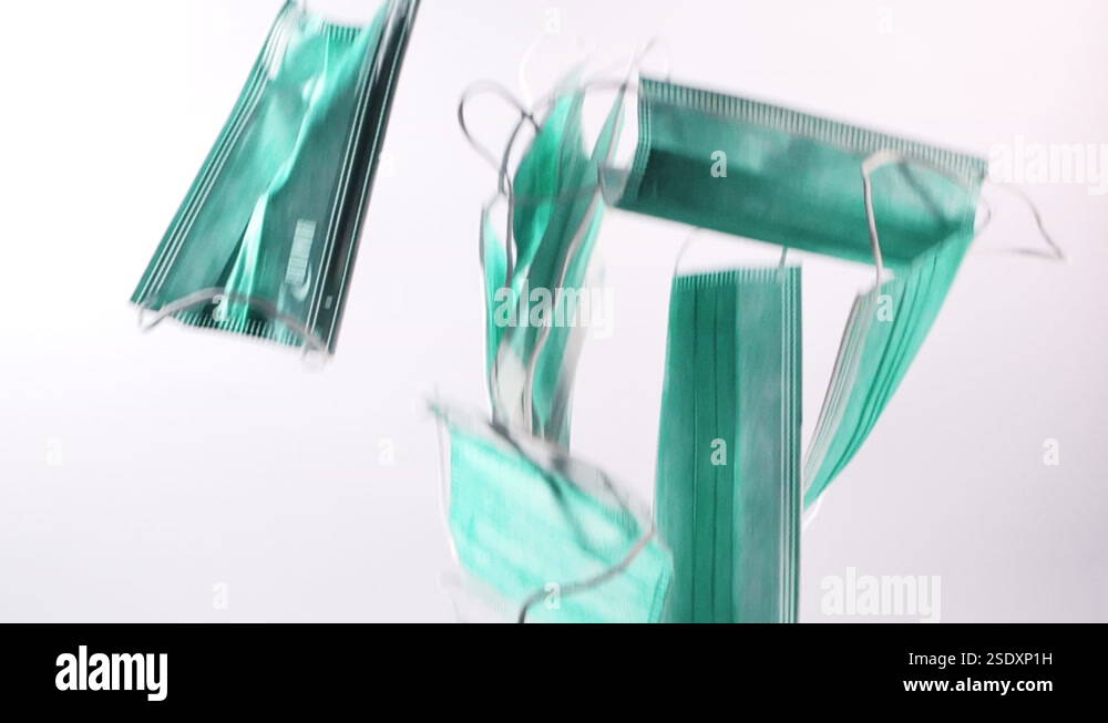 Pile of Surgical Mask Falling In Slow Motion Stock Video Footage - Alamy
