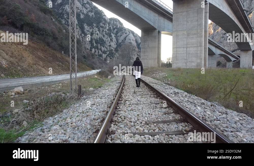 Girl Walking On A Railroad Female Model Walks On A Railroad Stock