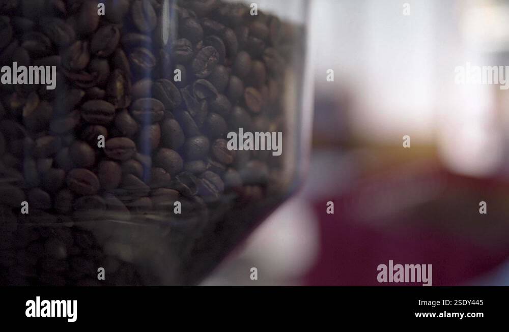 Coffee Beans On Bean Hopper In Coffee Machine. - close up, slider Stock ...