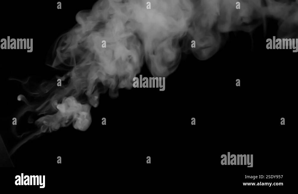 Jet of white smoke on a black background. CO2 pollutant emission the ...