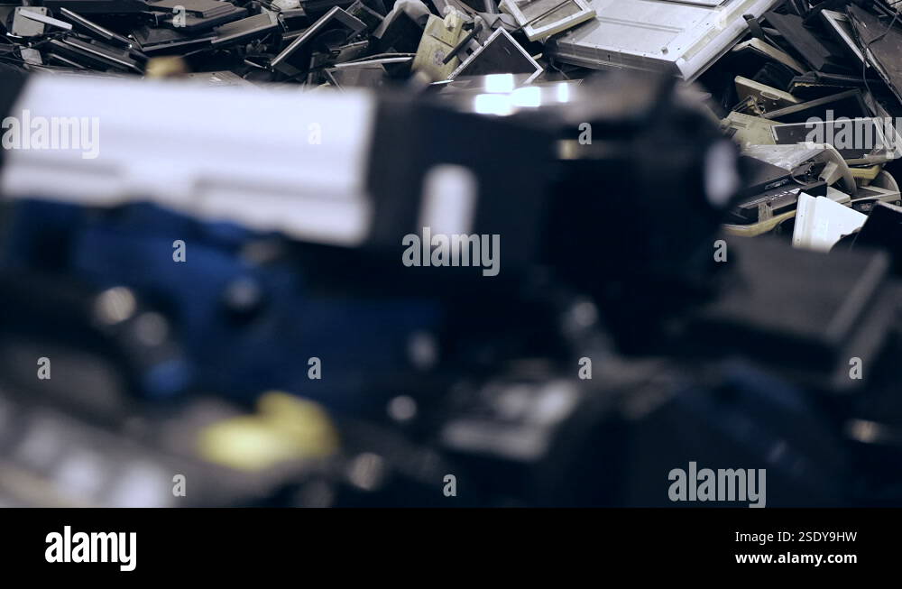 A huge pile of old displays. Discarded office equipment for recycling ...