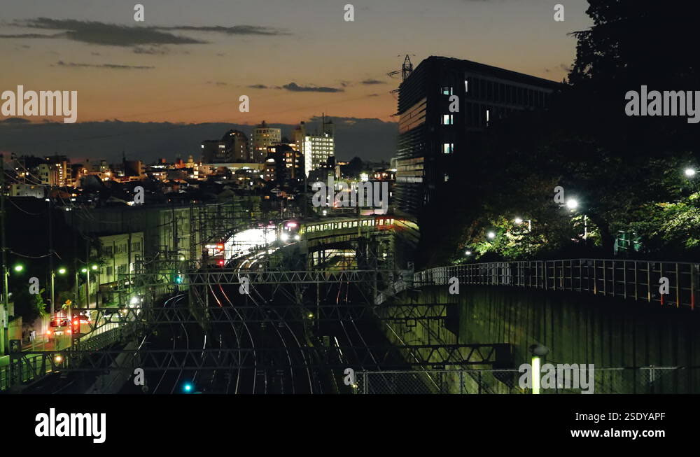 Two Japanese Trains Meet And Passing Each Other On Railway Track With City Stock Video Footage ...