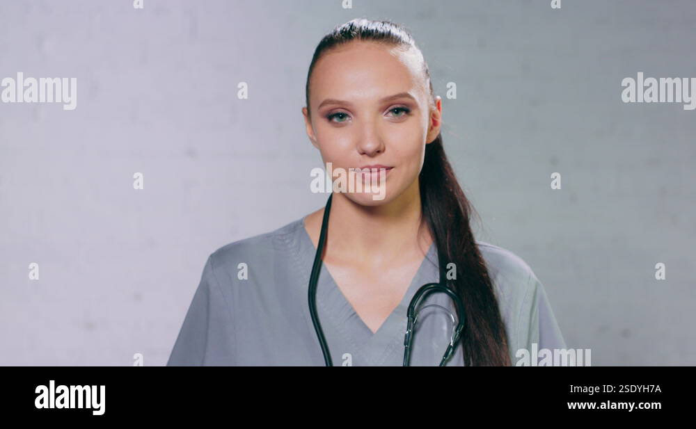 Young female doctor blogger vlogger influencer sit at studio speaking ...