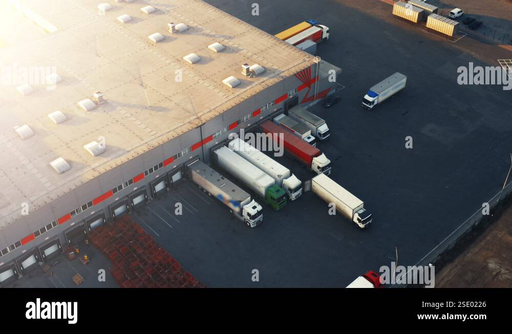 Logistics park with a loading hub. Semi-trailer trucks stand at the ...