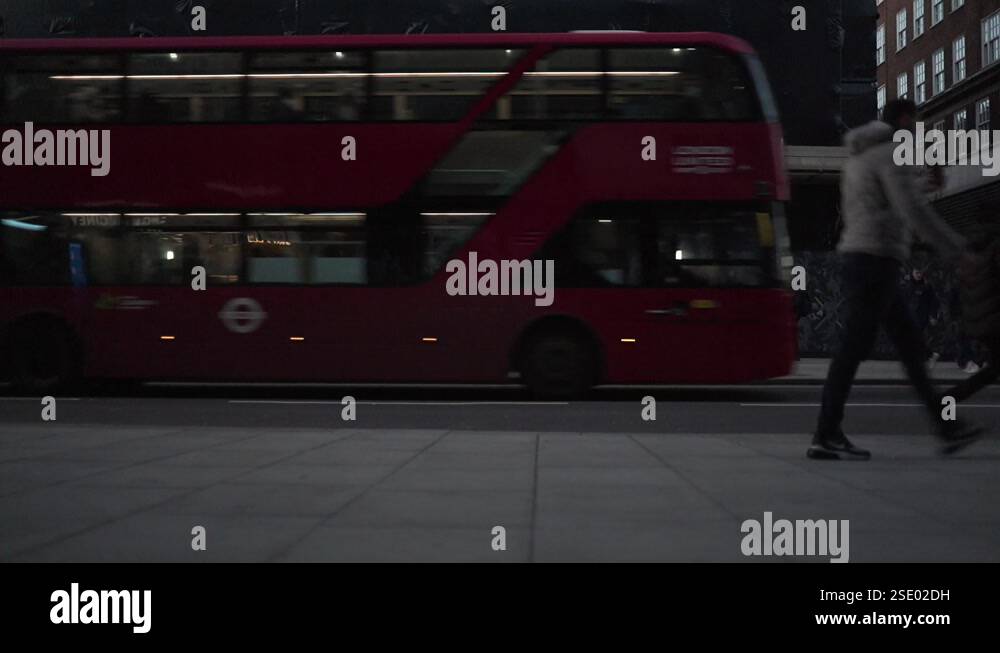 People walking down Oxford Street in both directions with Red Buses in the Stock Video Footage ...