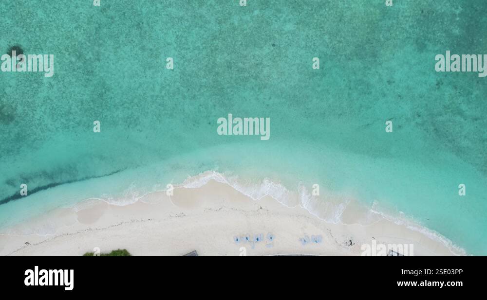 A drone rises over a beach in the Maldives Stock Video Footage - Alamy