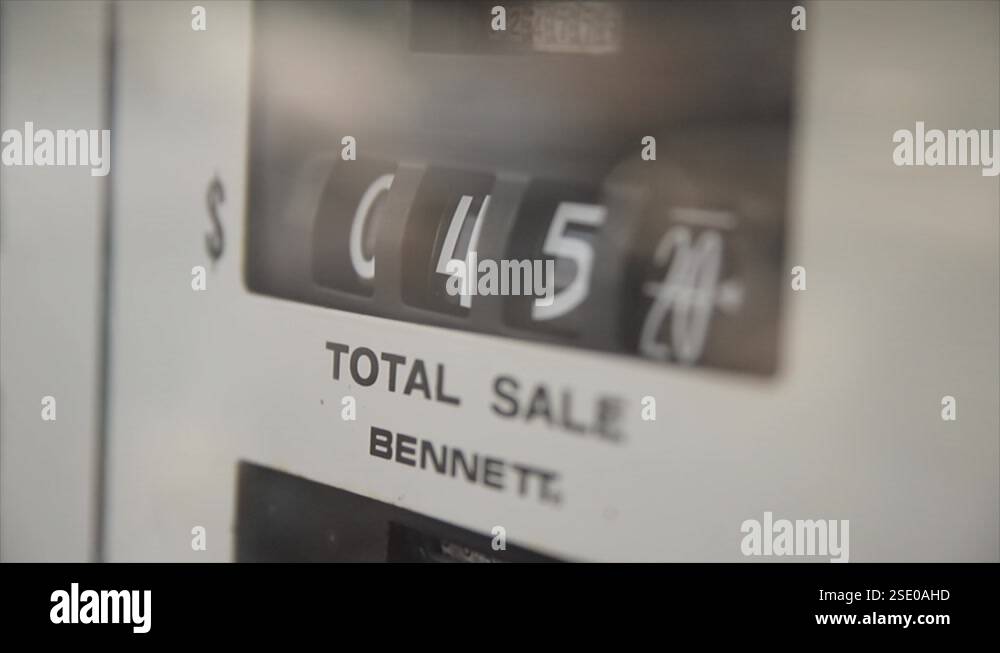 Old Vintage Gas Pump Meter with Scrolling Numbers as Vehicle is Fueled ...