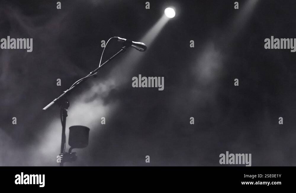 Microphone on stage in mist and smoke Stock Video Footage - Alamy