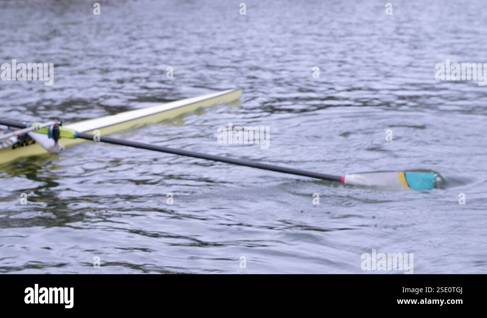 Rower practising sweep technique in single-scull rowing boat with Stock ...