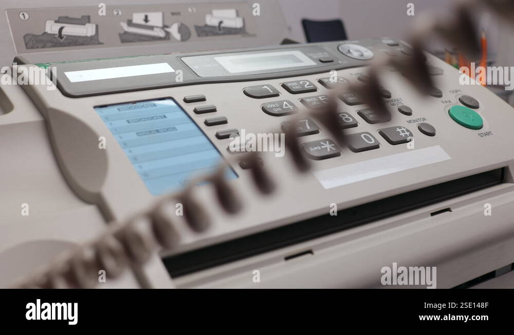 A Man's Hand Picks Up The Phone And Dials A Phone Number On The Dust ...