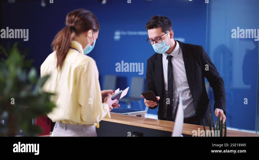 Visa refusal. Young security agent woman checking customer ID ...