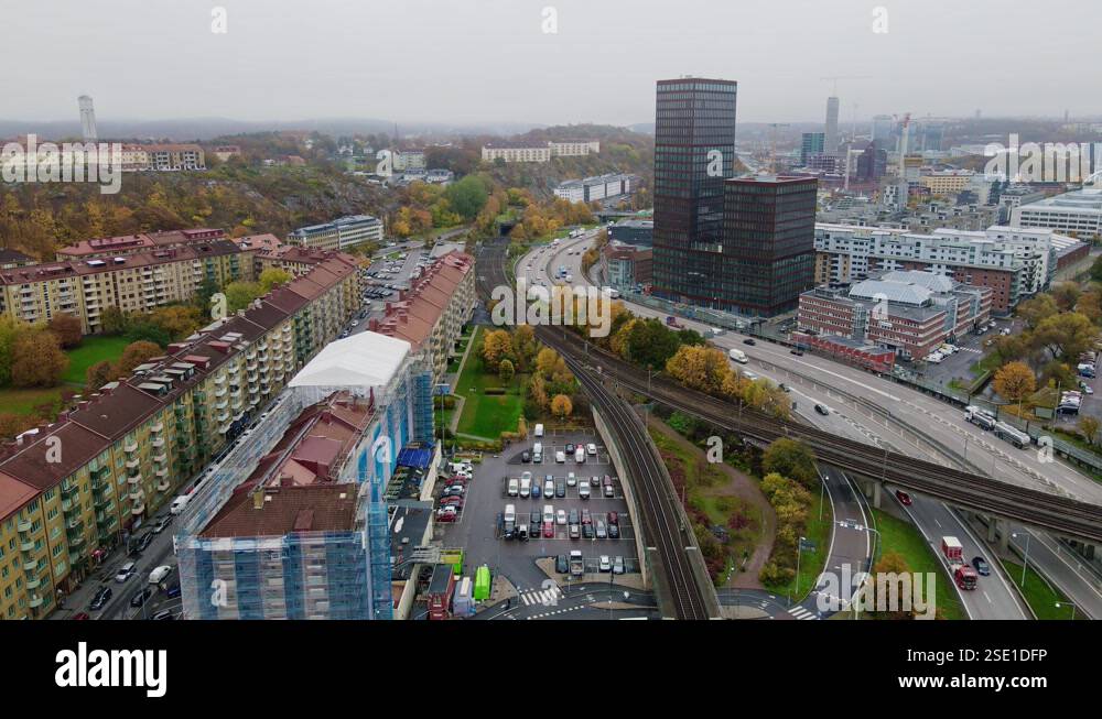 Vehicles Driving By A New Building Being Constructed Along E6 ...
