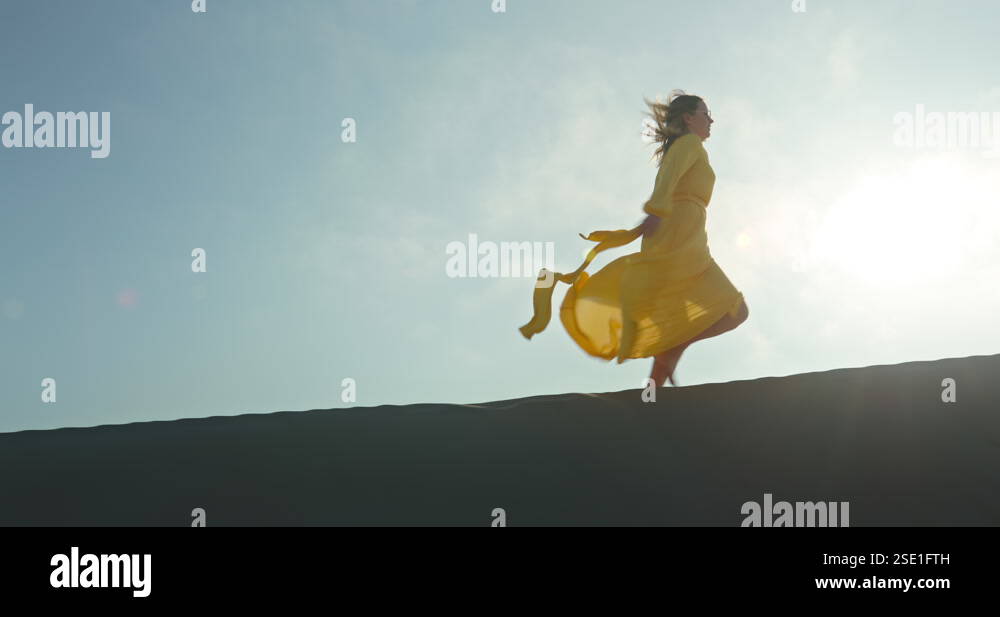 Slow motion people background with copy space. Beautiful woman running ...
