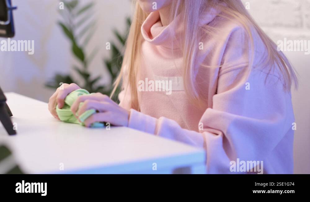 Little girl blogger influencer talking with followers live streaming ...