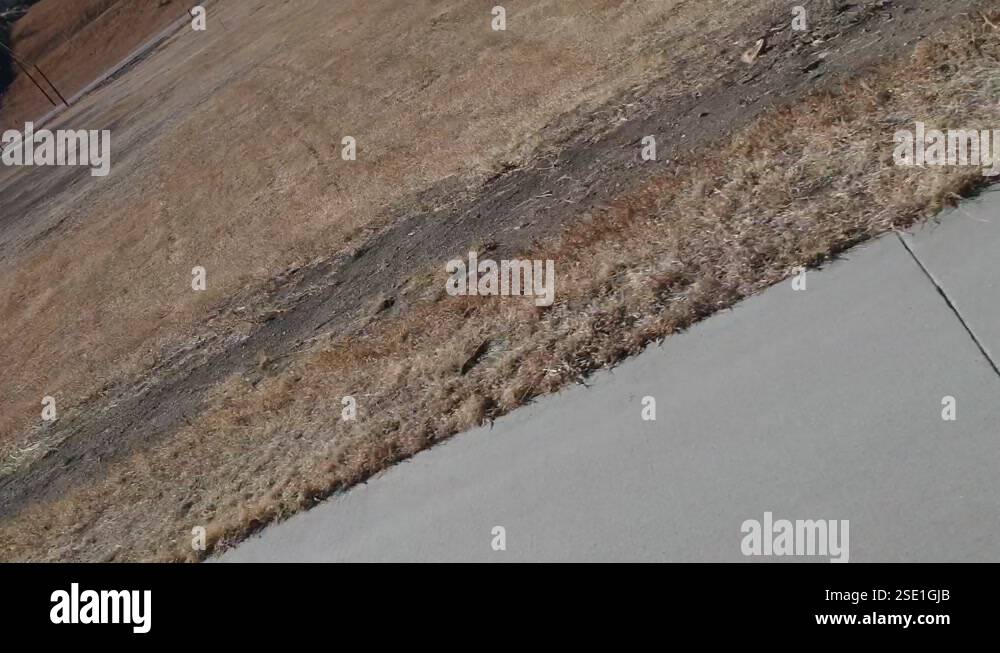 A drone shot along a bike path Stock Video Footage - Alamy