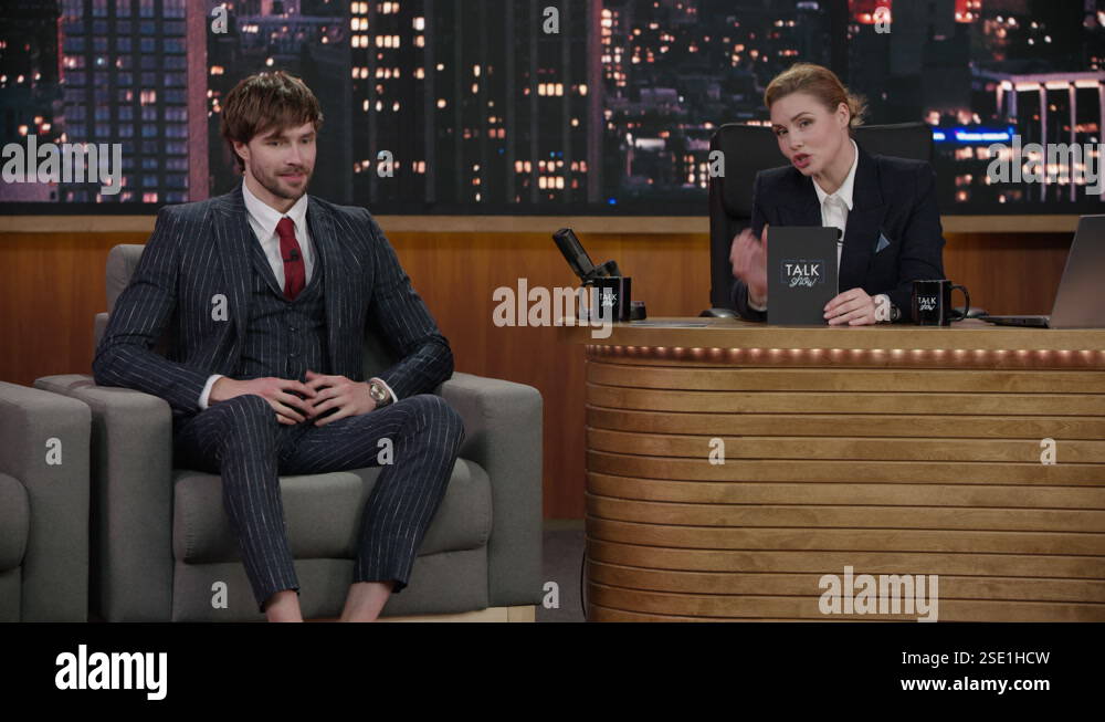 Late-night talk show female host having a conversation with celebrity ...