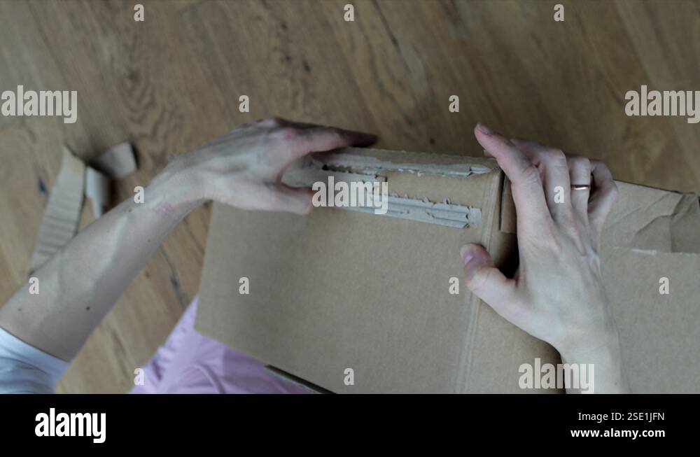 Female is opening the box with the order Stock Video Footage - Alamy