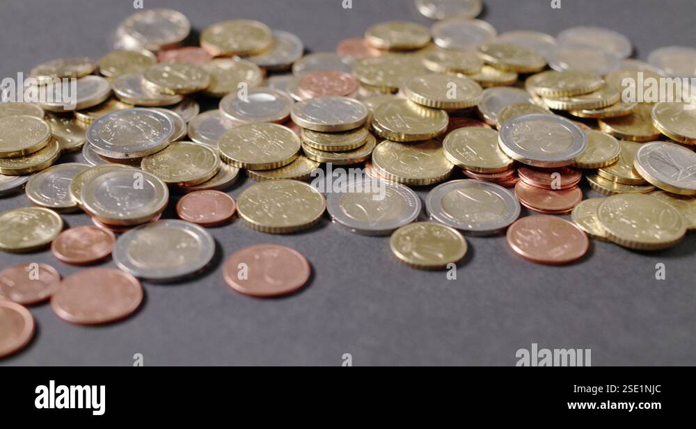 Closeup panning over Euro Coins, Europe Monetary System. Many different ...